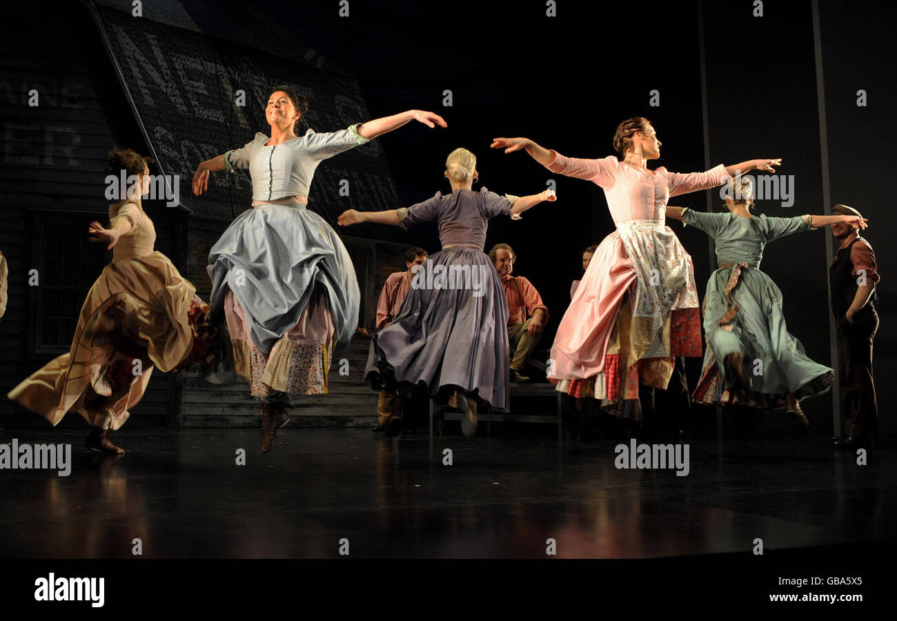 The cast perform a dance scene from Richard Rodgers and Oscar ...