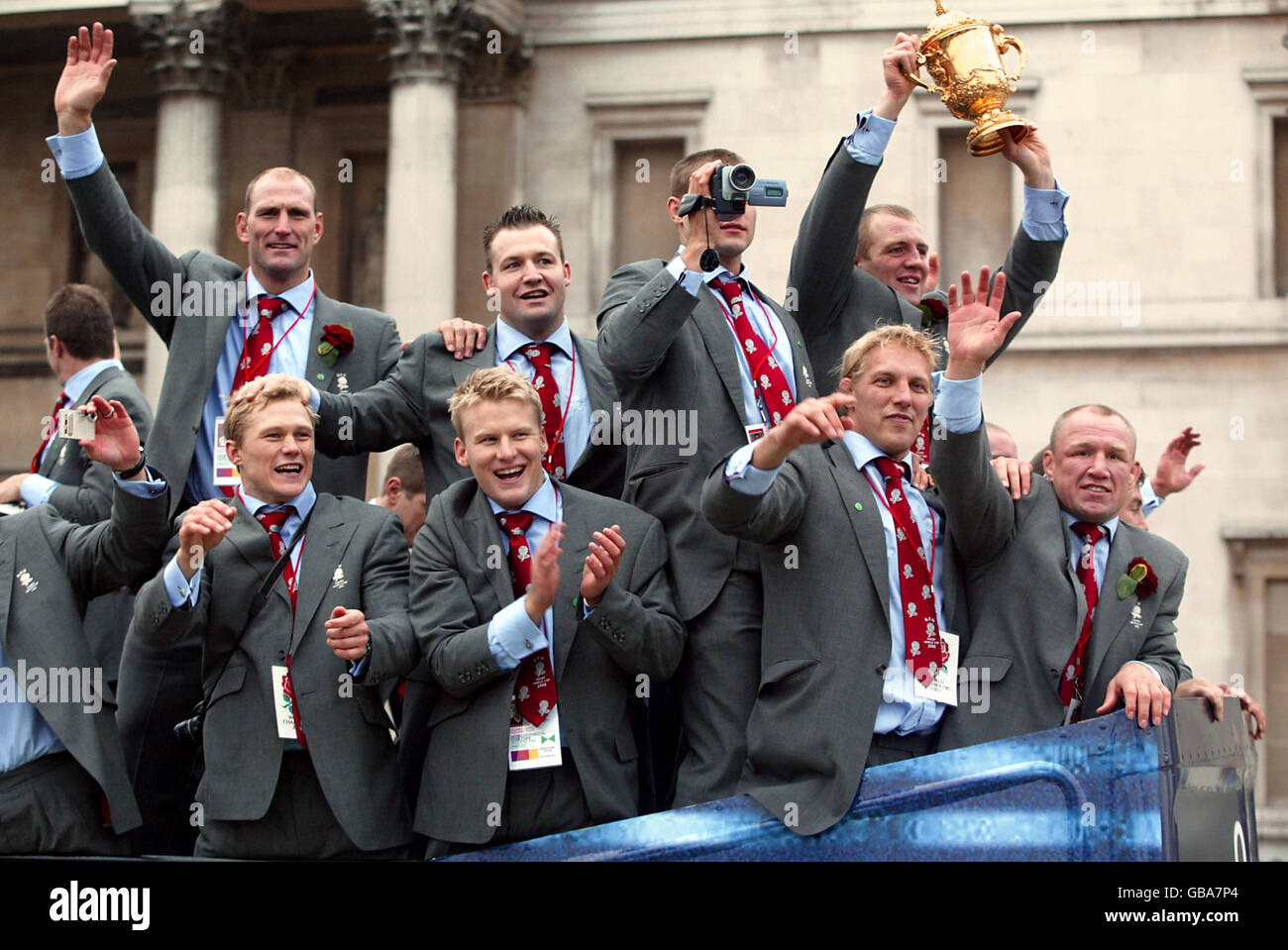 The England Rugby team arrive in Trafalgar Square on the open top bus ...