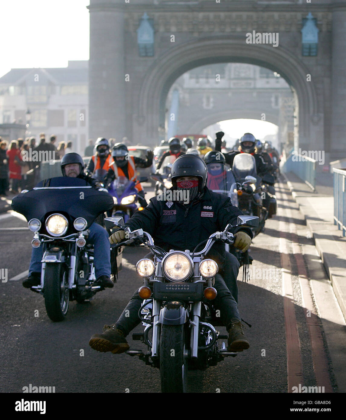 Bikers from the Ace Cafe in north London ride over Tower Bridge during ...