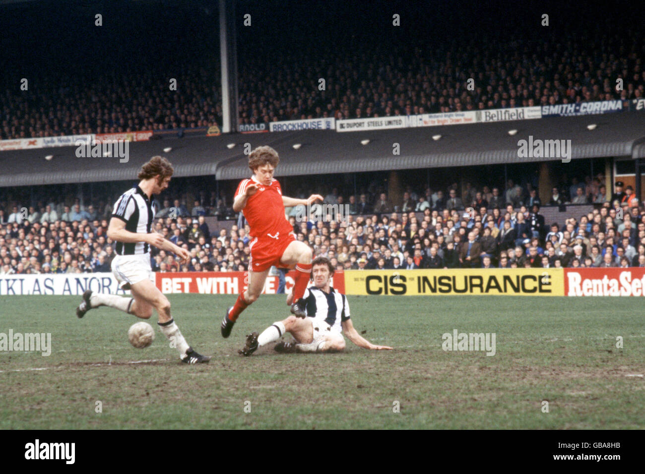 West Bromwich Albion's John Wile (r) tackles Nottingham Forest's Tony ...