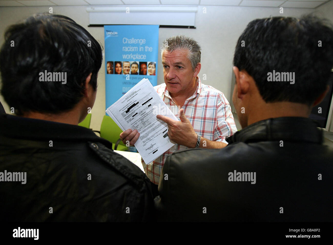 Ken Flemming of the International Transport Federation, with two ...