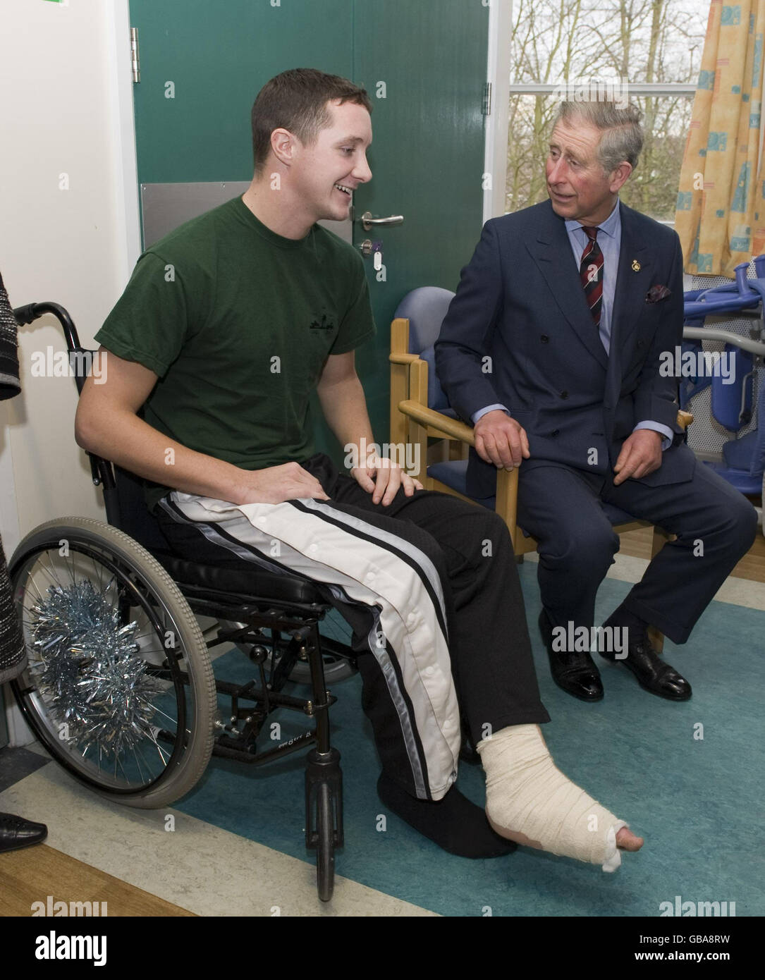 The Prince of Wales talks to RAF SAC Michael Goody during a visit to ...