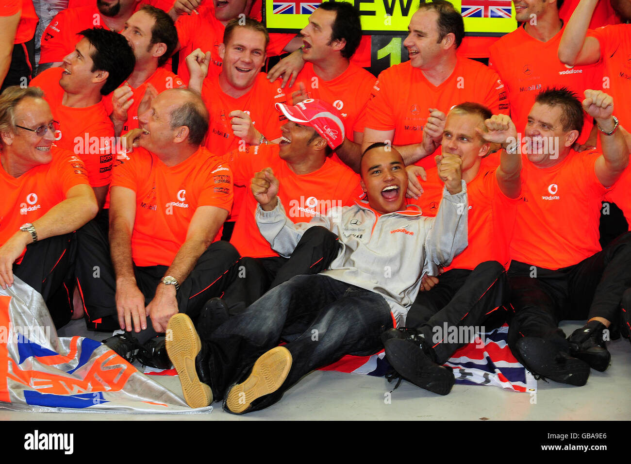 McLaren Mercedes' Lewis Hamilton celebrate with his brother Nick and ...