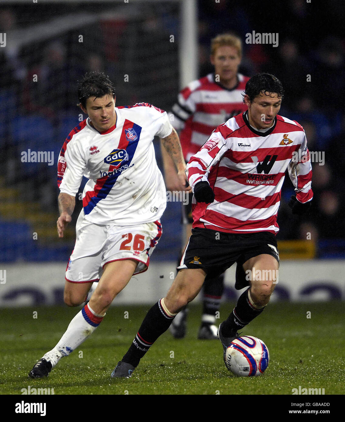 Crystal Palace's John Oster and Doncaster's John Spicer battle for the ...