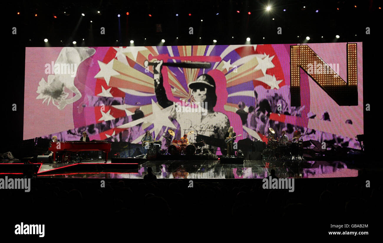 Elton john performing red piano tour o2 arena hi-res stock photography ...