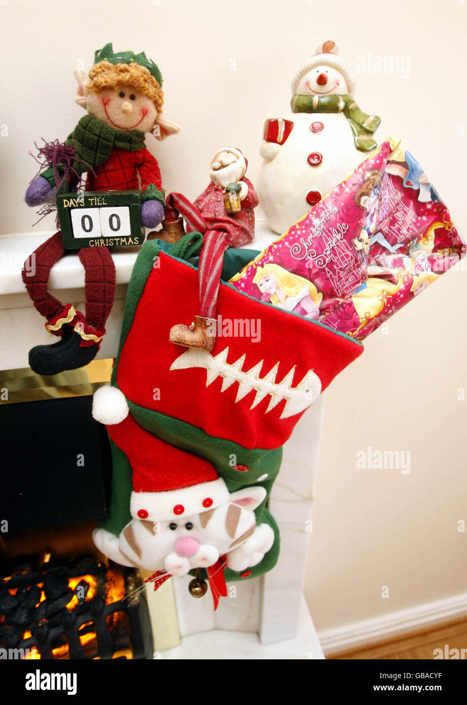 Christmas xmas tree presents stockings fire decorations. Stock photo of ...