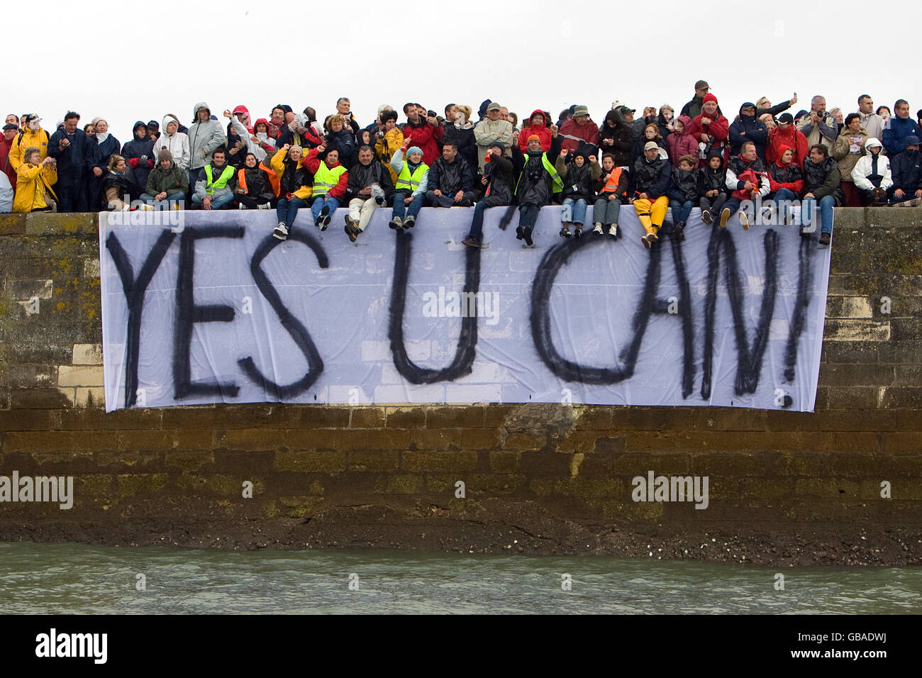 Some of the thousands of sailing fans along the harbourside to see off ...