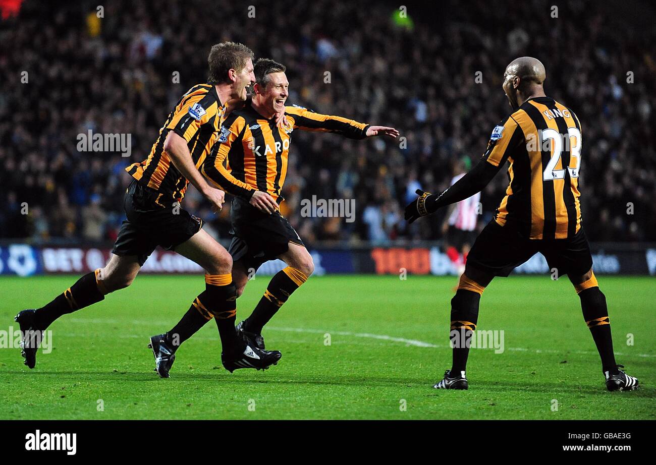 Hull City's Nick Barmby (centre) celebrates with his team mates after ...