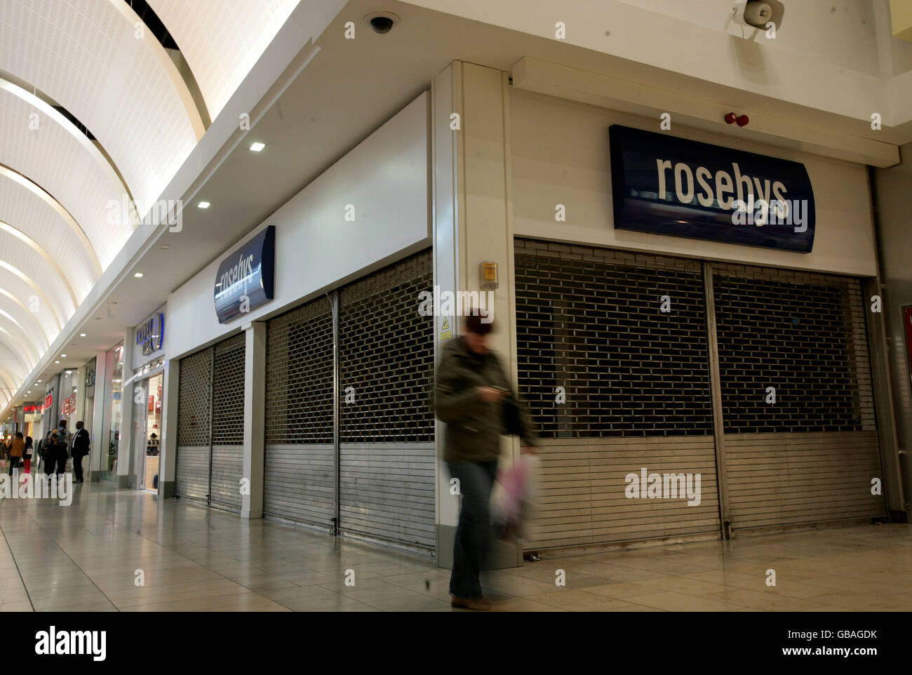 A woman walks past a Rosebys store in Southside Shopping Centre ...