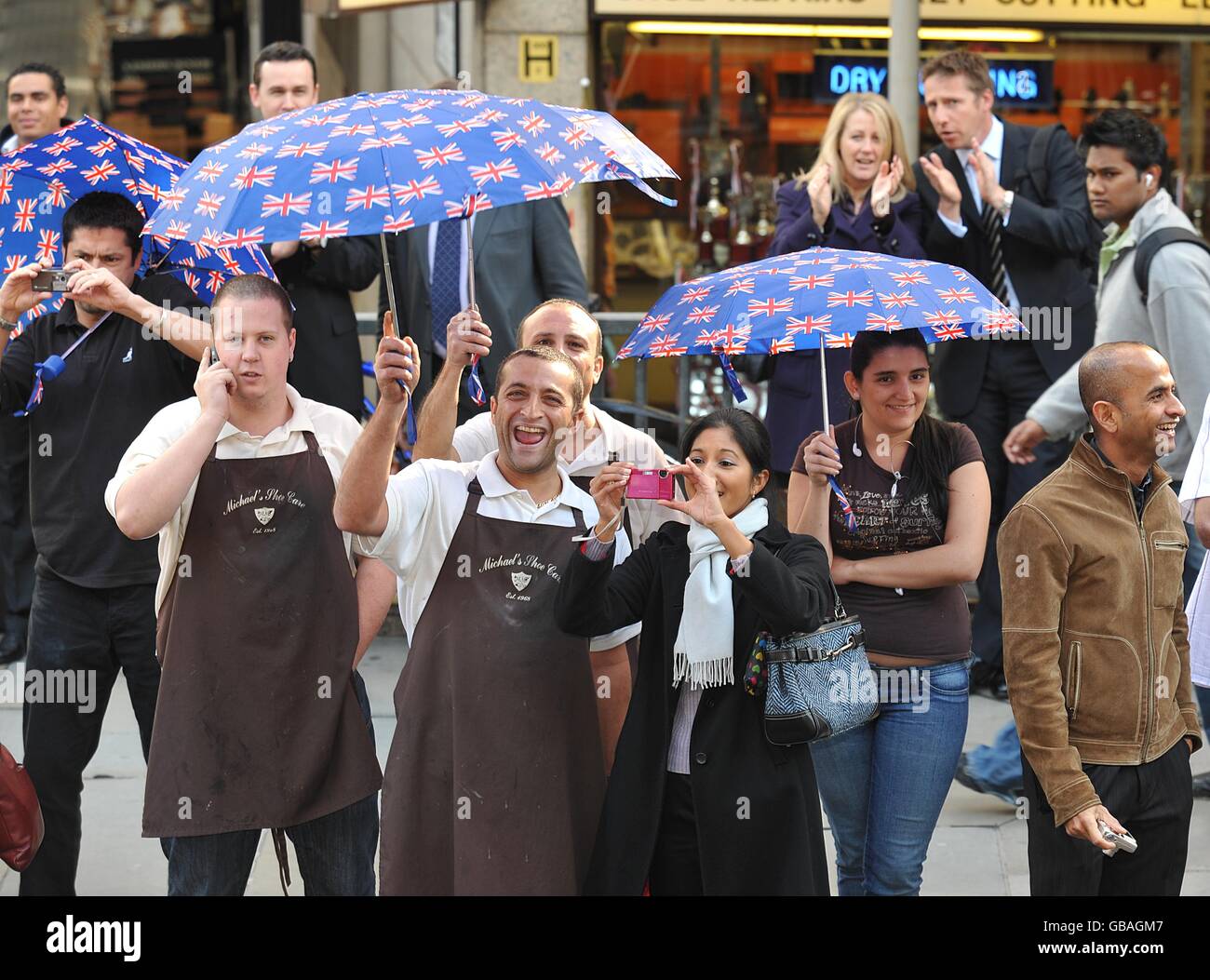 Crowds gather in the streets to celebrate the Team GB homecoming Parade ...