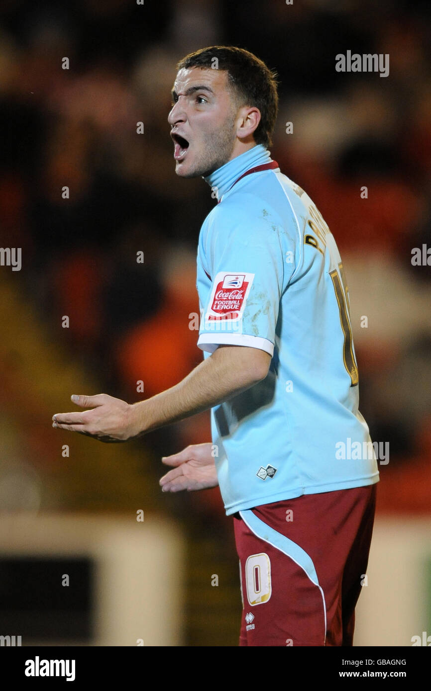 Burnley's Martin Paterson attempts to encourage the away fans Stock ...