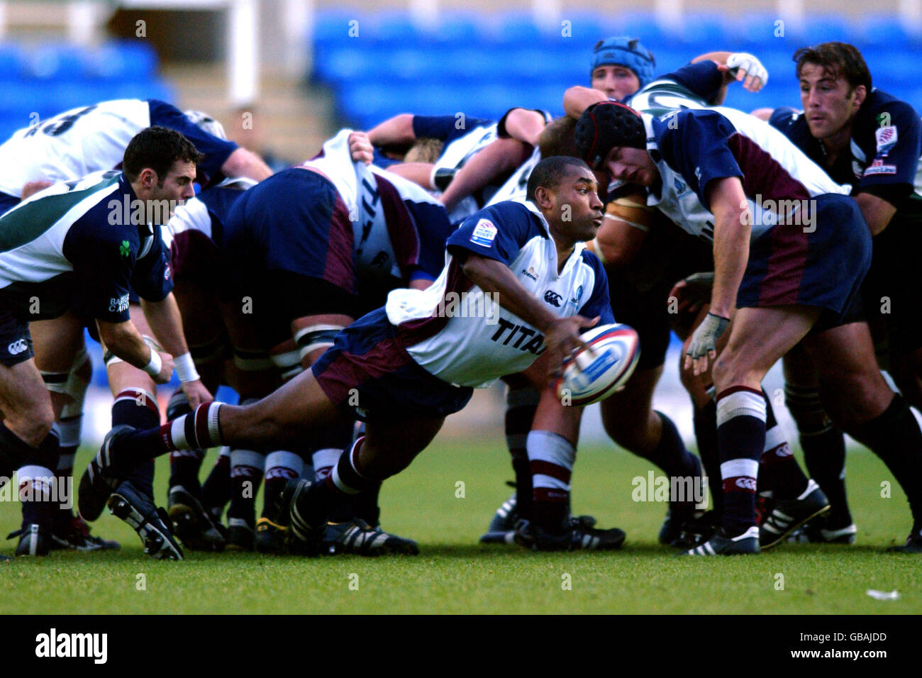 Rotherham's Jacob Rauluni (c) makes a diving pass from the back of the ...