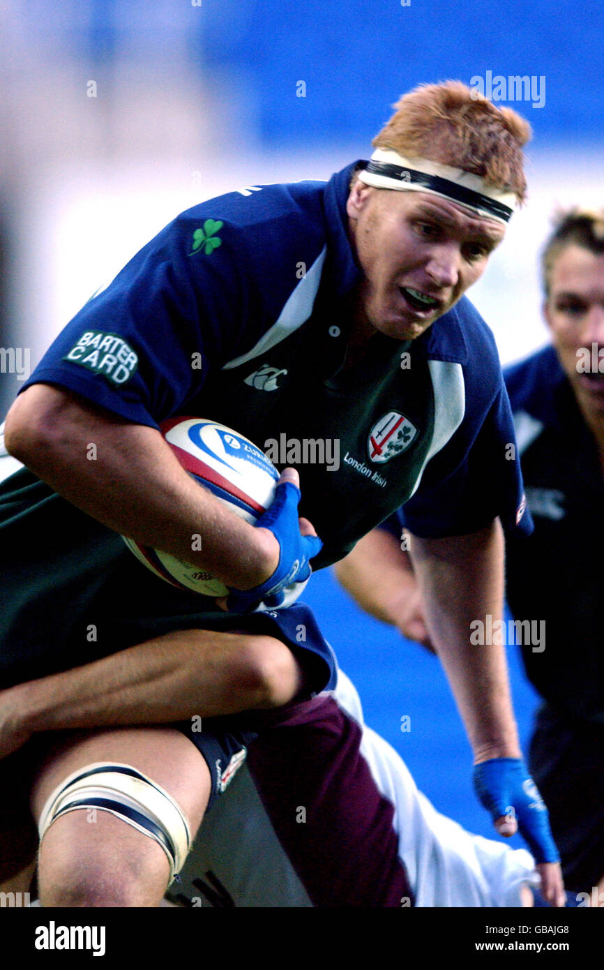 London irishs ryan strudwick tries to break through the tackle hi-res ...