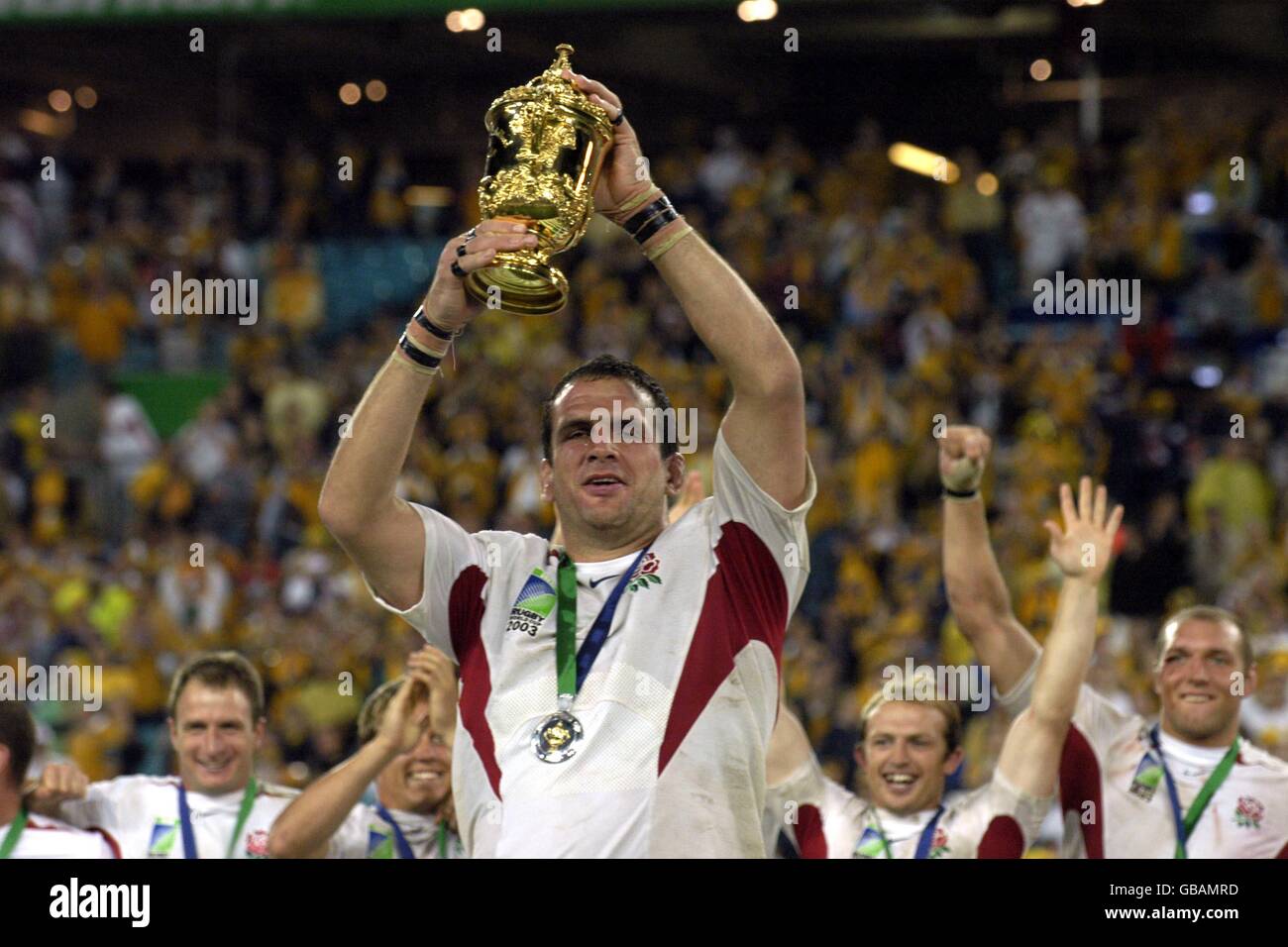 England captain Martin Johnson celebrates with the World Cup Webb Ellis ...
