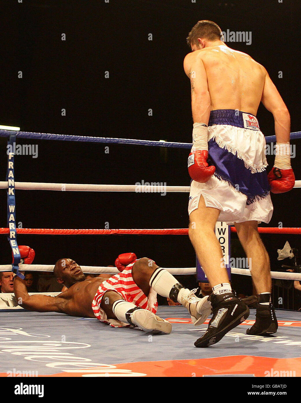 Nathan Cleverly knocks out Douglas Otieno during the Commonwealth Light ...
