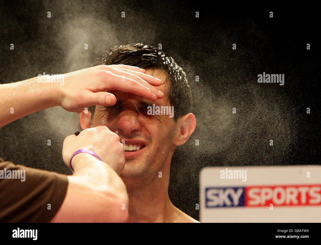 Manchester's Stephen Bell is sprayed during the Super Featherweight ...