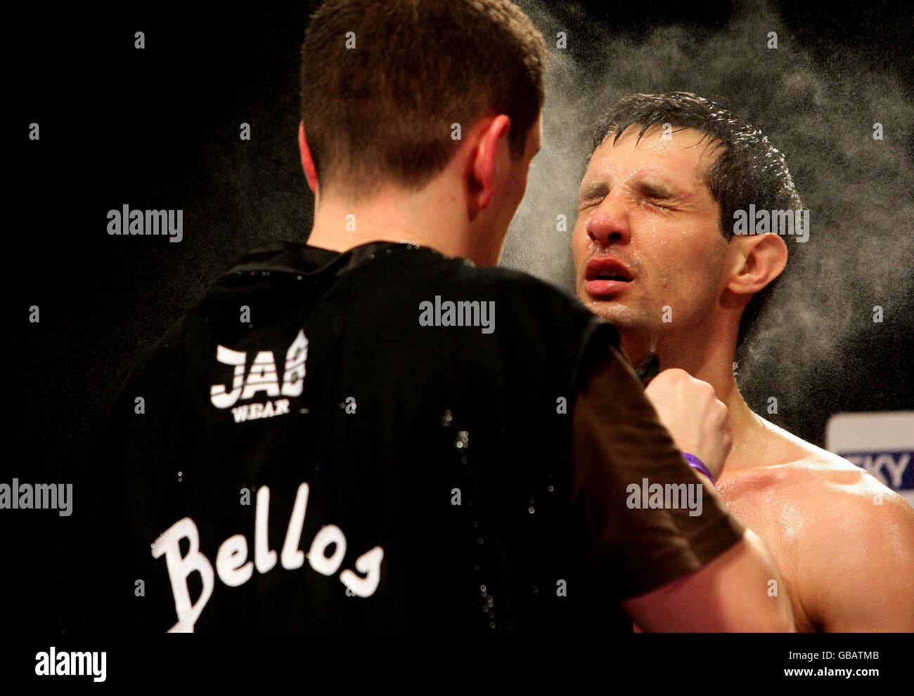 Manchester's Stephen Bell is sprayed with water during the Super ...
