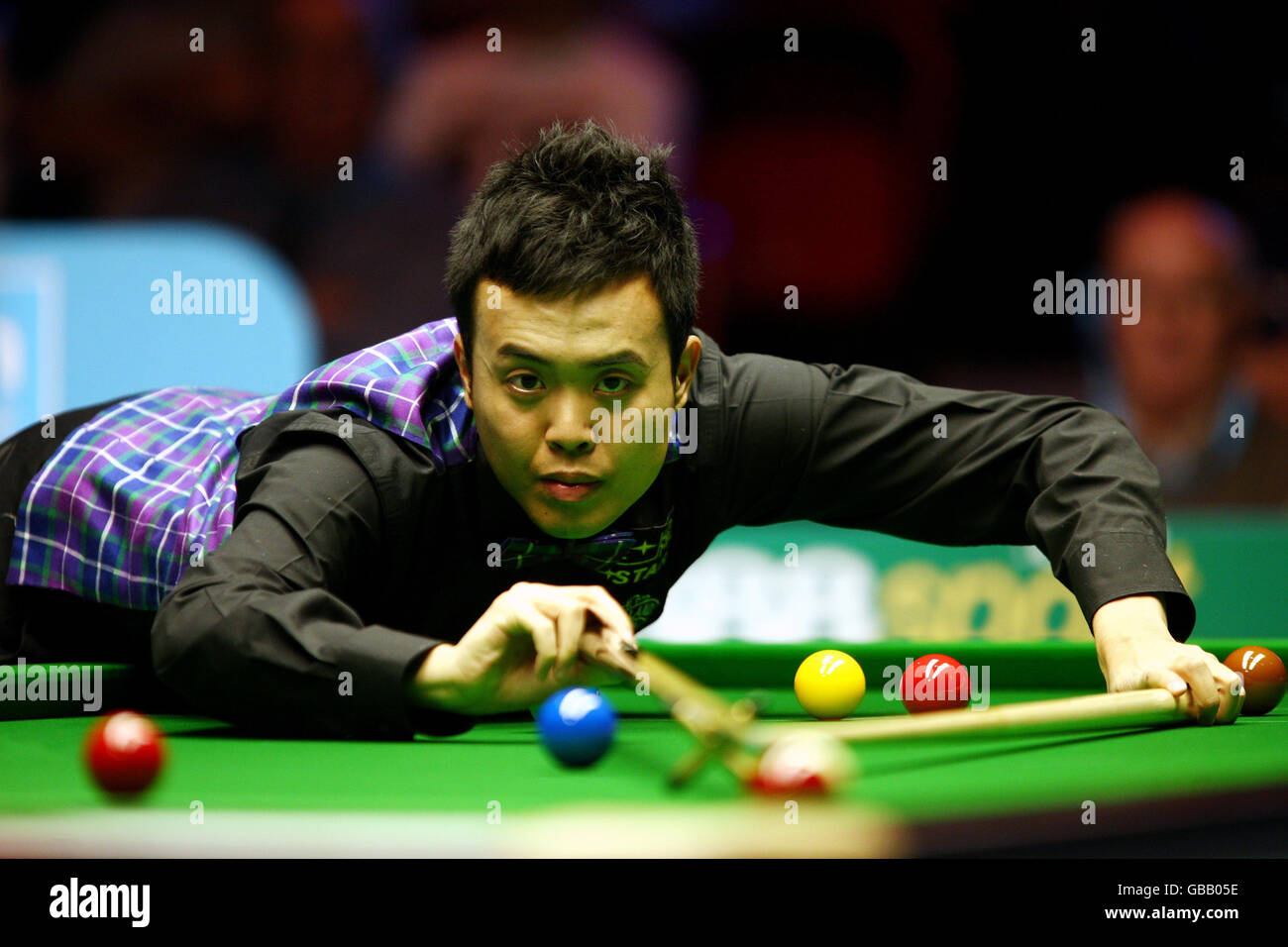 Marco Fu in action against Allister Carter during the semi final match ...