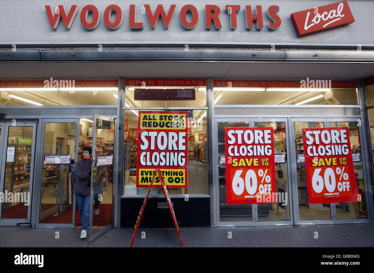 A shopper leaves a branch of Woolworths on Raeburn Place in Edinburgh ...