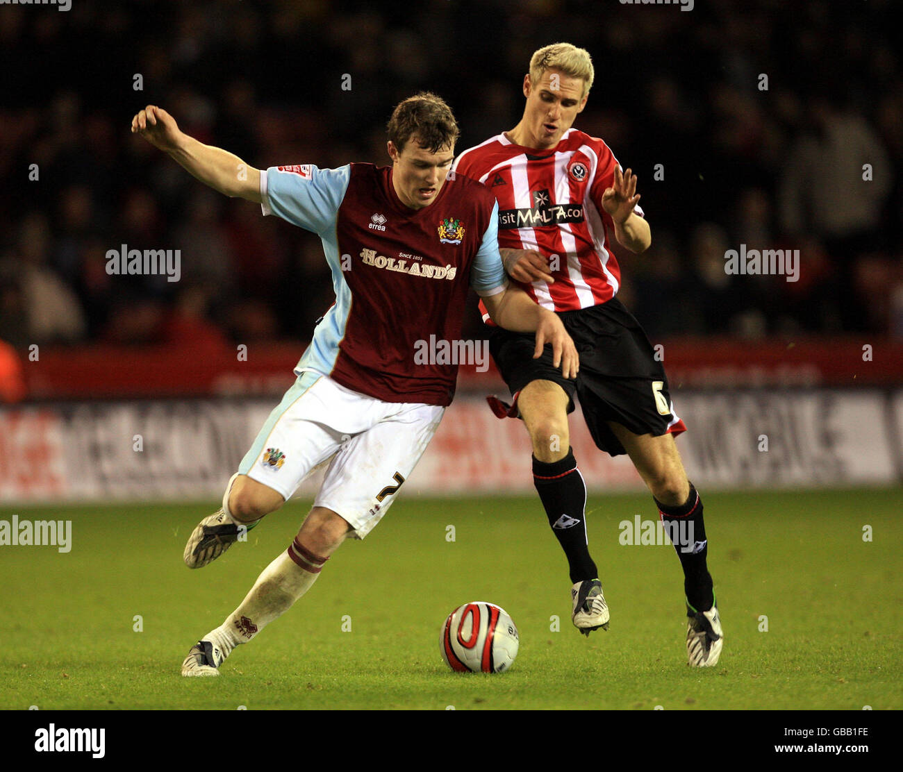 Sheffield United's Matthew Kilgallon and Burnley's Kevin McDonald ...