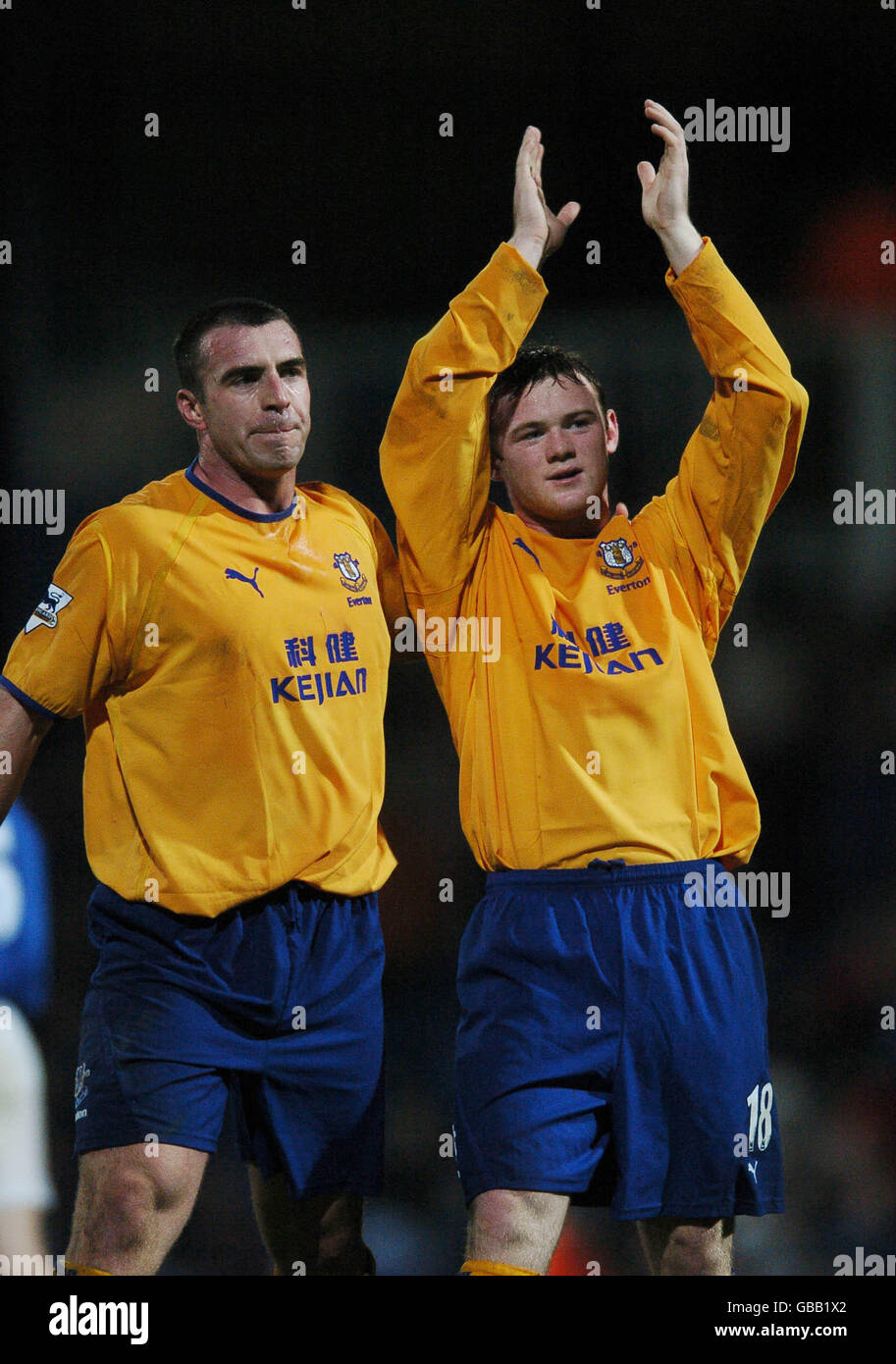 Everton's David Unsworth and Wayne Rooney celebrate at the end Stock ...