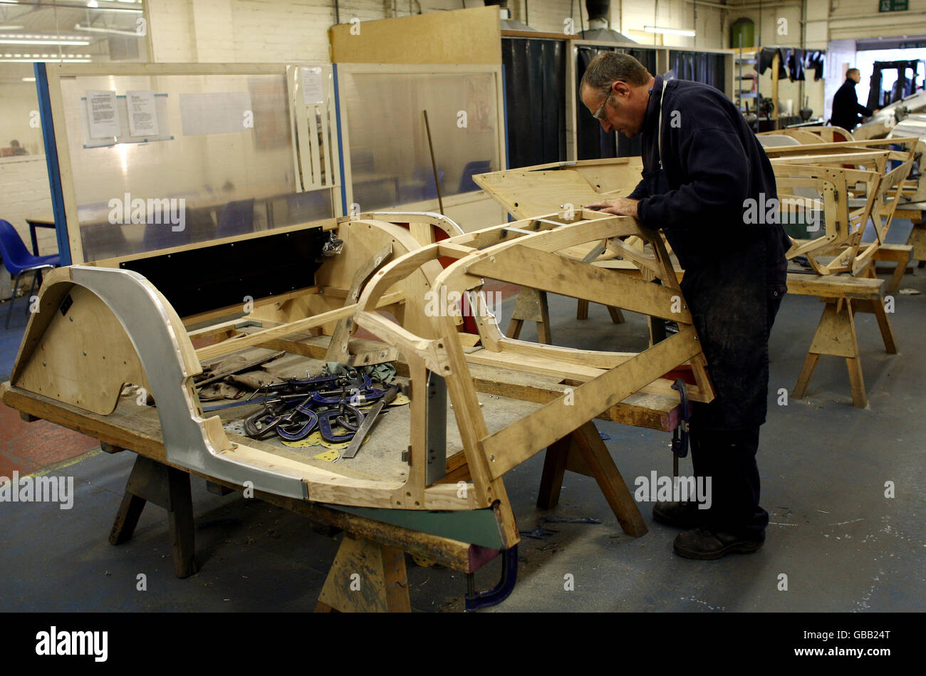 Work is carried out on the traditional wooden frame of the Morgan at ...