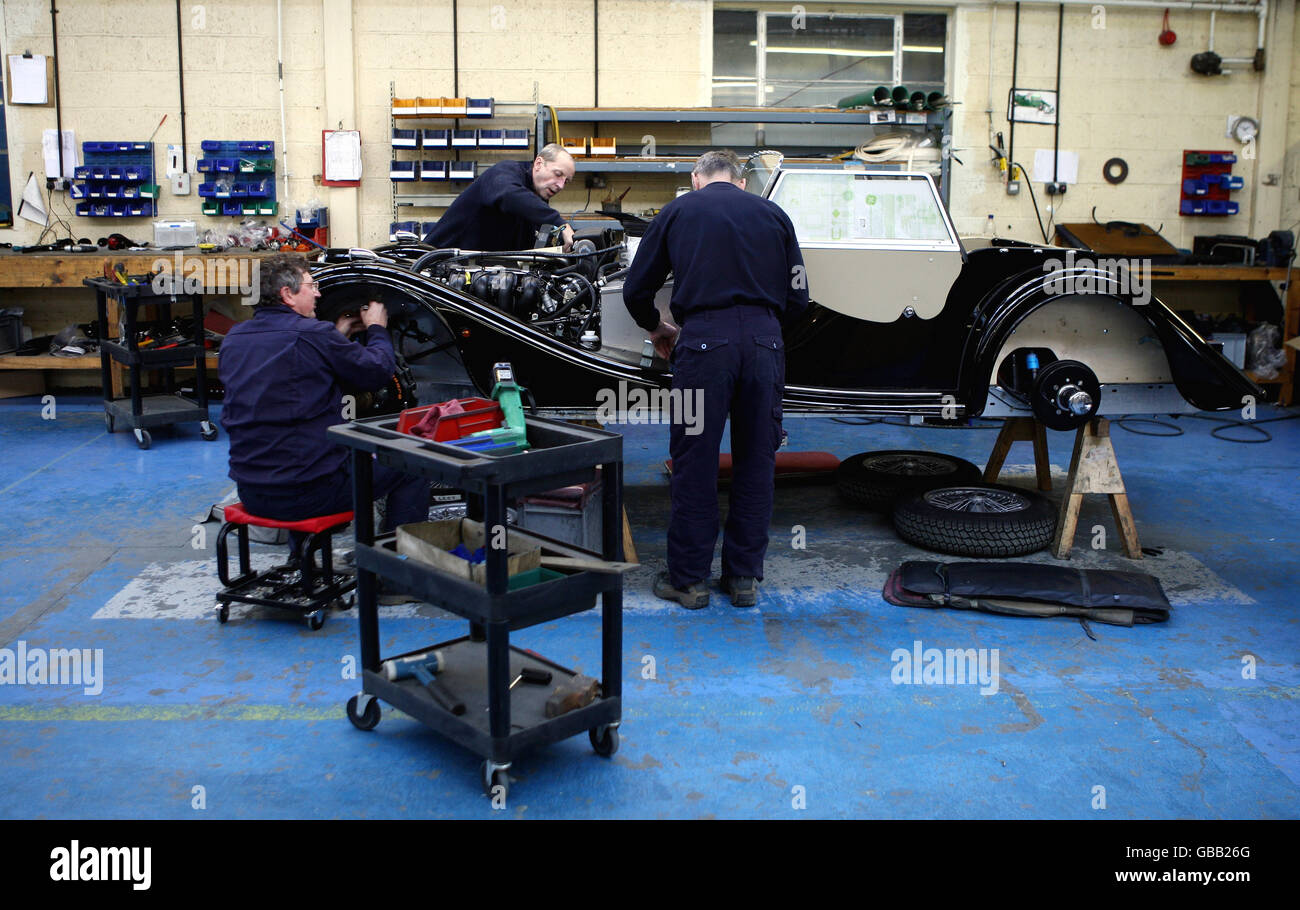 Three men work on a Morgan Stock Photo - Alamy
