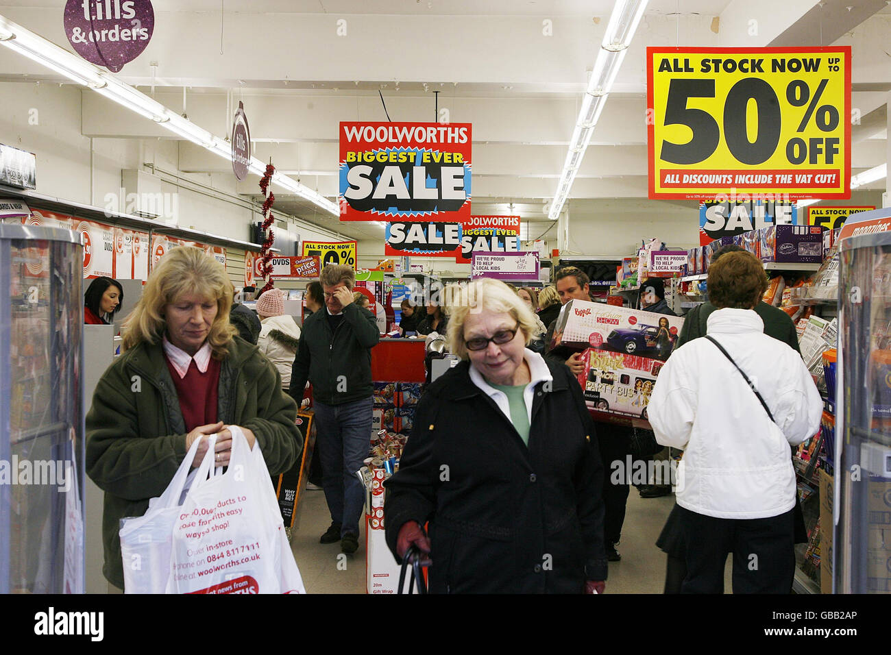Shoppers in a Woolworths store in Billericay, Essex as the company ...