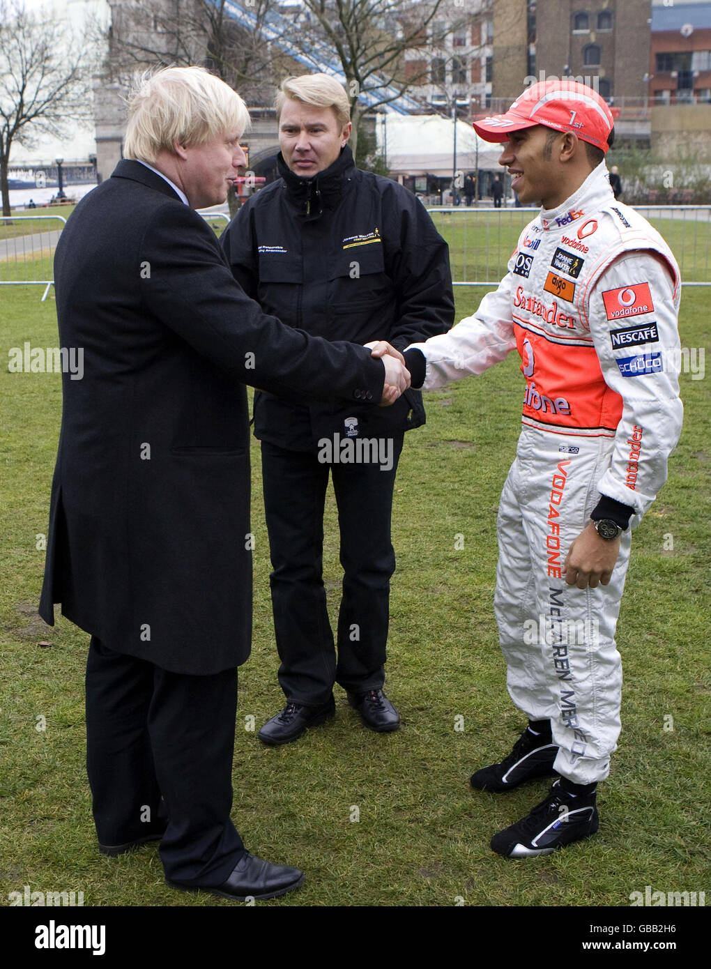 Retired Formula 1 World Champion Mika Hakkinen (centre) and current ...