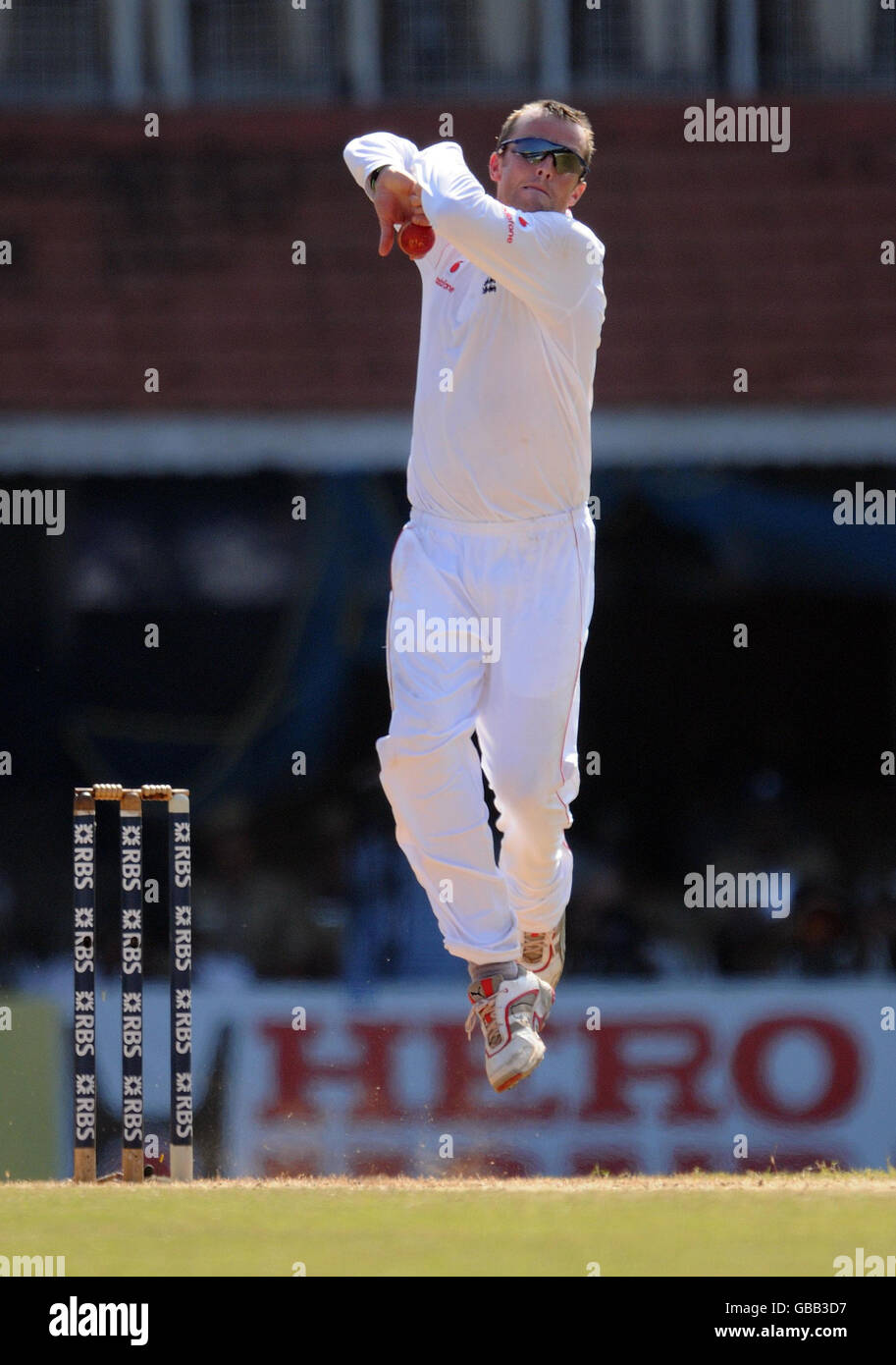 Cricket action bowling jumping hi-res stock photography and images - Alamy