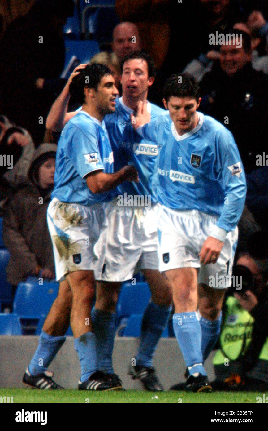 Manchester City's Robbie Fowler (centre) is congratulated on scoring ...