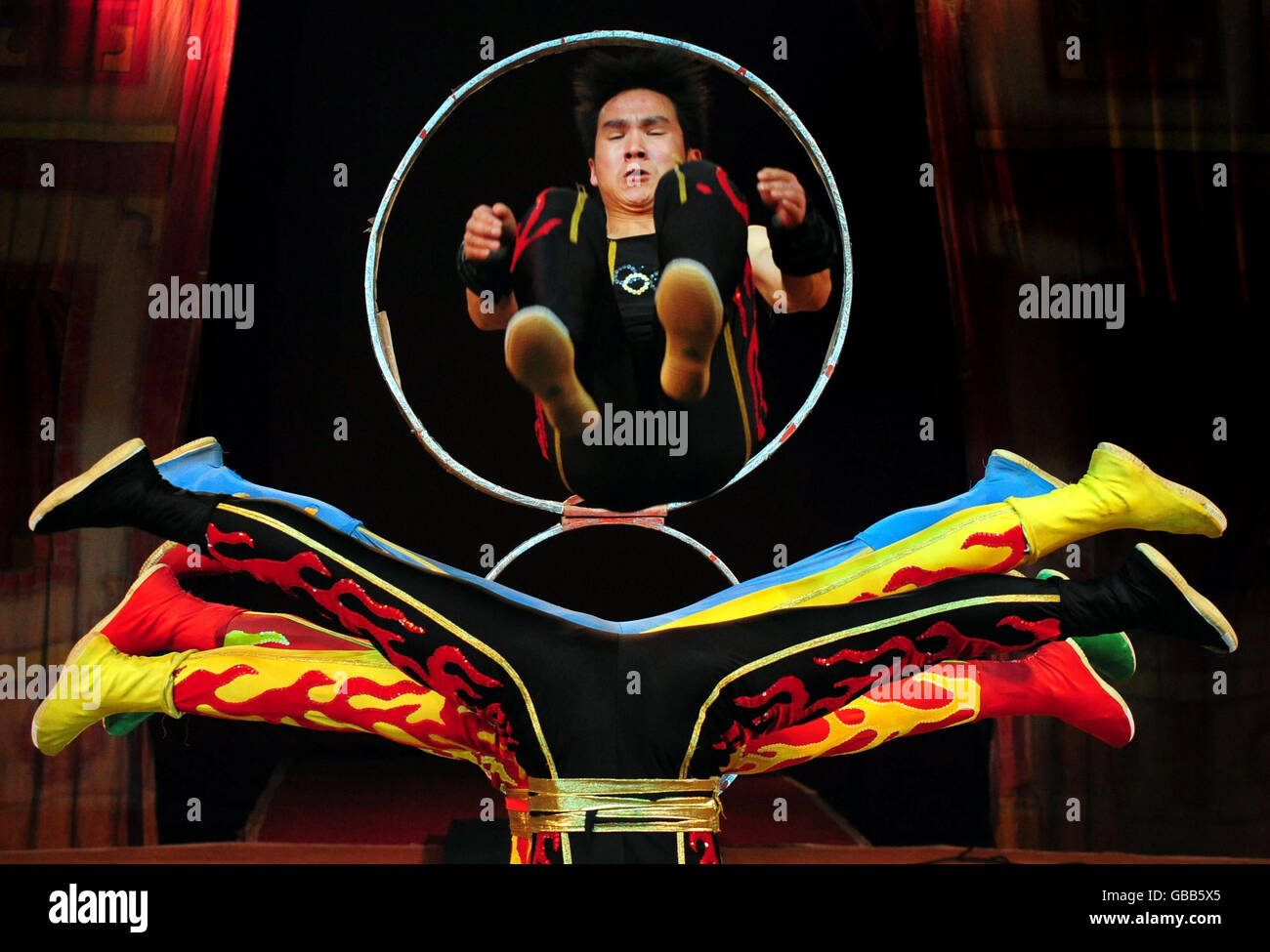 Hoop diving act chinese state circus in birmimgham hi-res stock ...