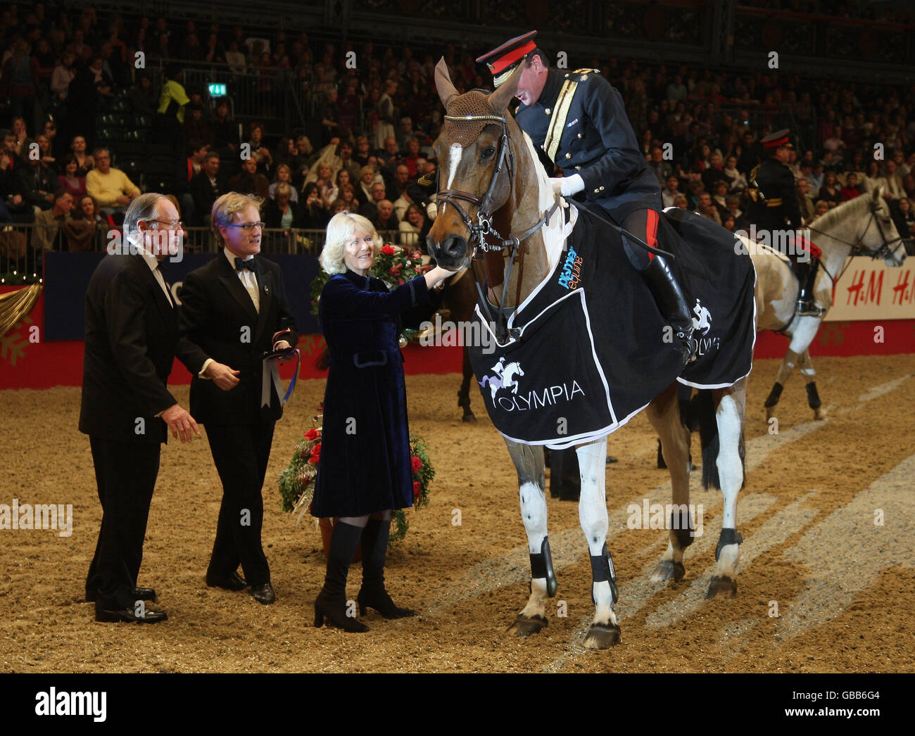 The Duchess of Cornwall presents the winning trophy to Major Richard ...