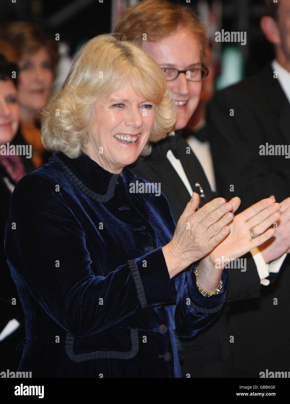 The Duchess of Cornwall claps alongside Simon Brooks-Ward as she ...