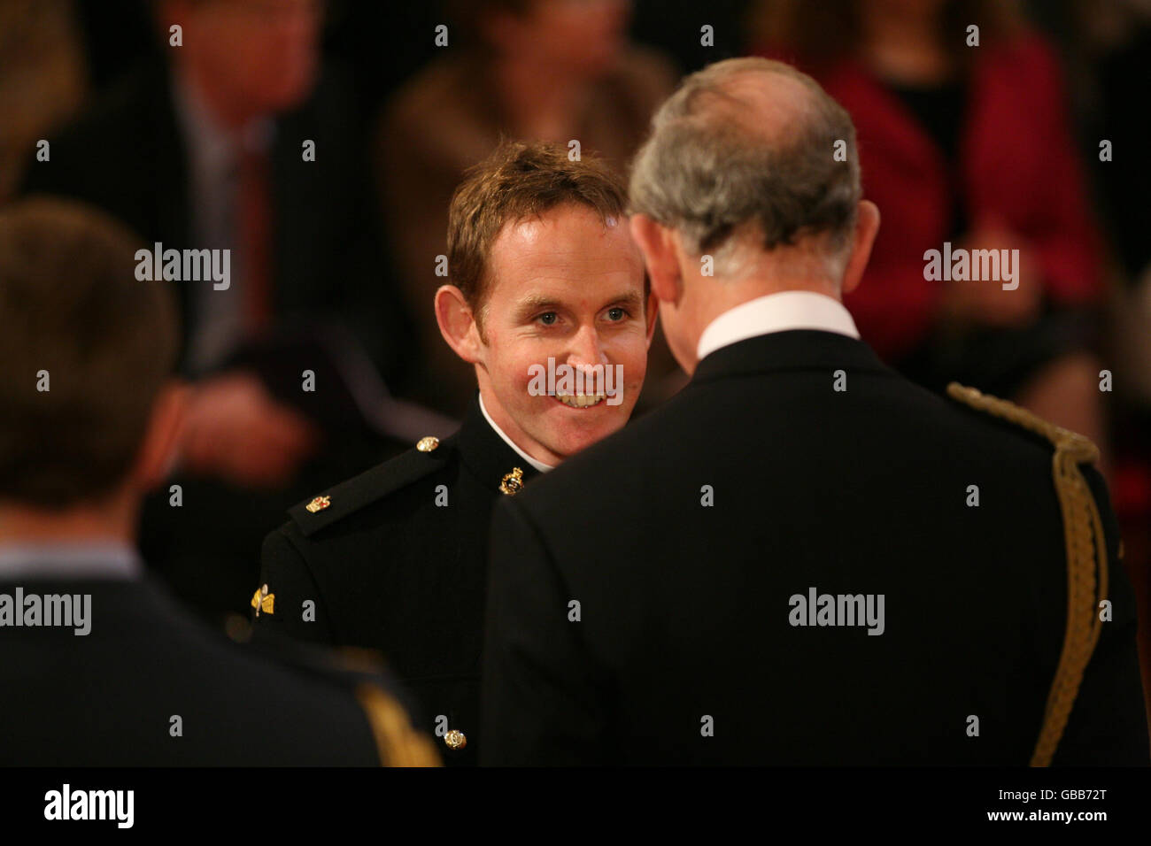 Major Douglas Reid, Royal Army Medical Corps, is given the Military ...