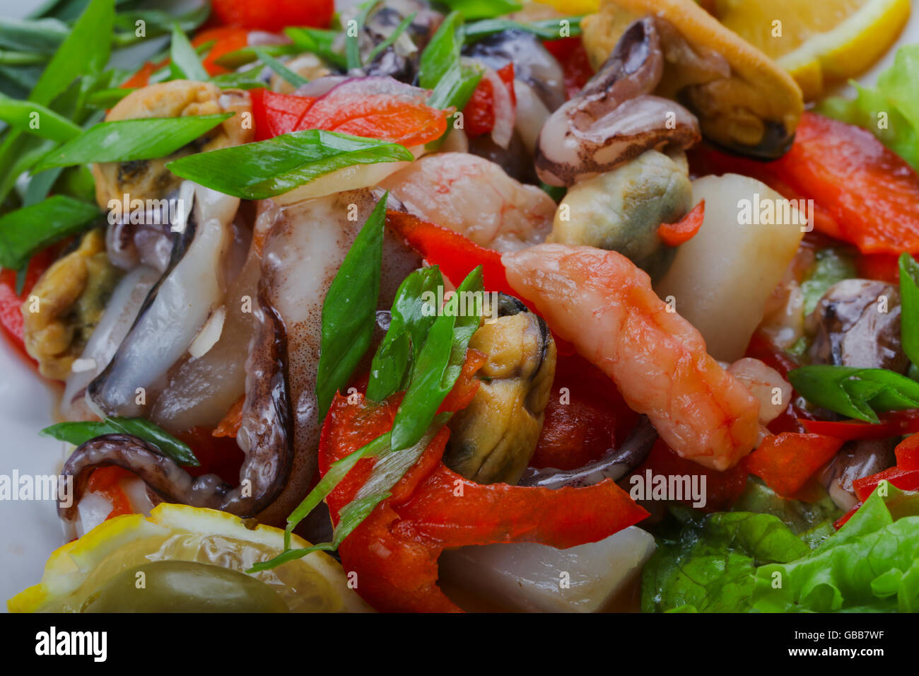 Seafood mix salad with squid, mussels and shrimps Stock Photo - Alamy