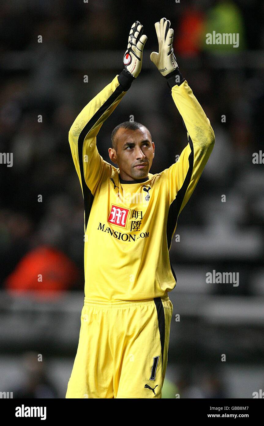 Tottenham hotspur goalkeeper applauds the fans hi-res stock photography ...