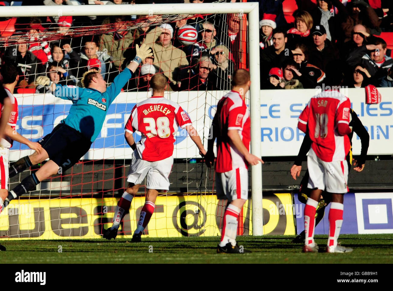 Charlton Athletic goalkeeper Rob Elliott can do nothing to stop Queens ...