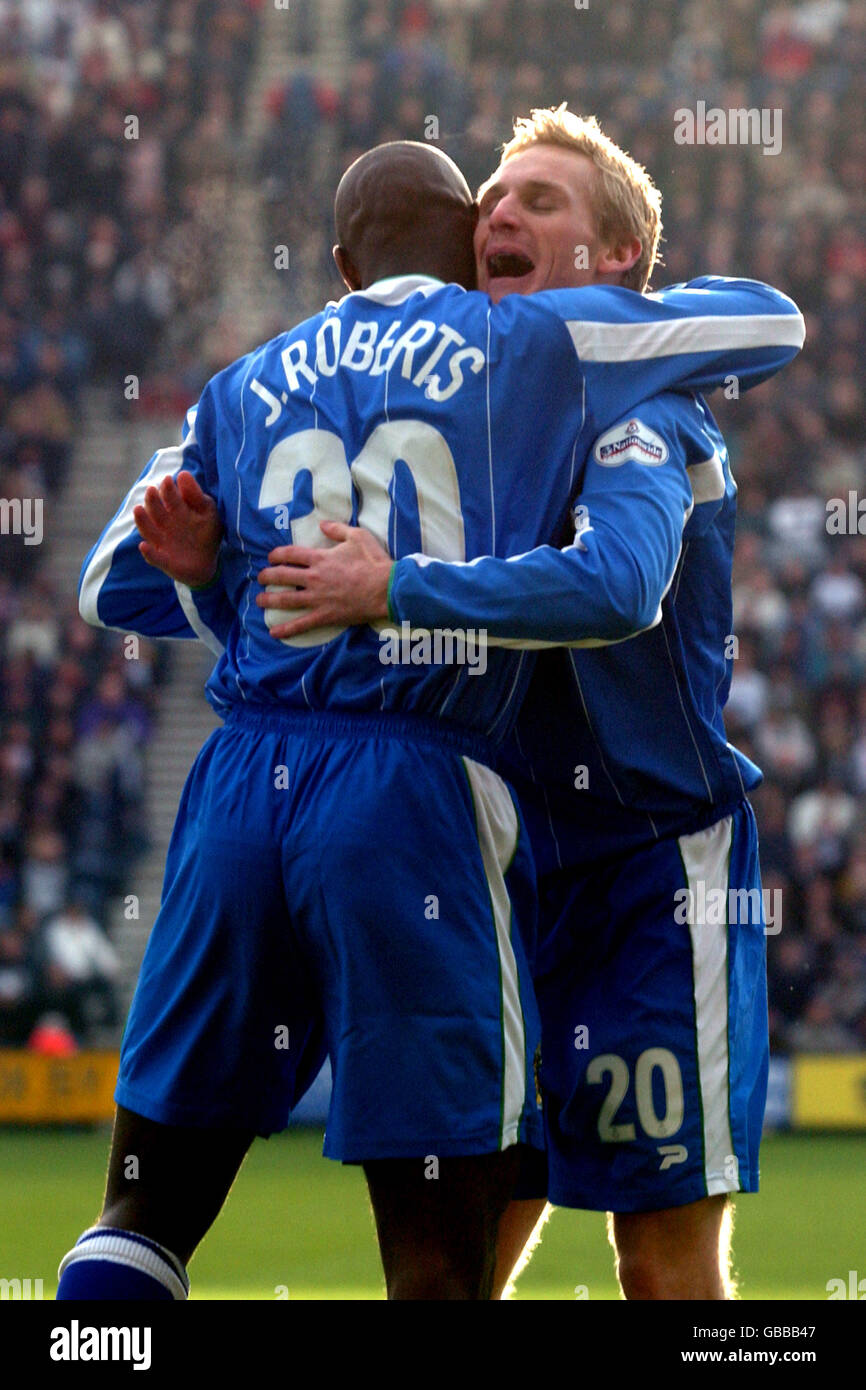 Celebration hug happy football close hi-res stock photography and ...