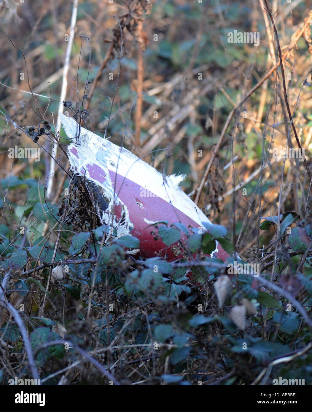 Debris at the scene after a light aircraft crashed onto the railway ...
