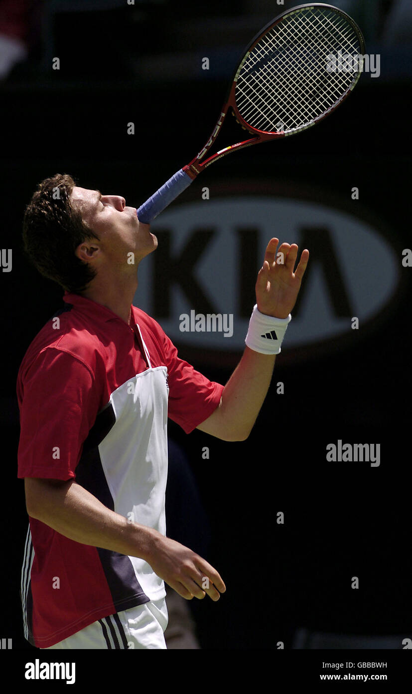 Marat Safin of Russia eats his racket in frustration during his match ...