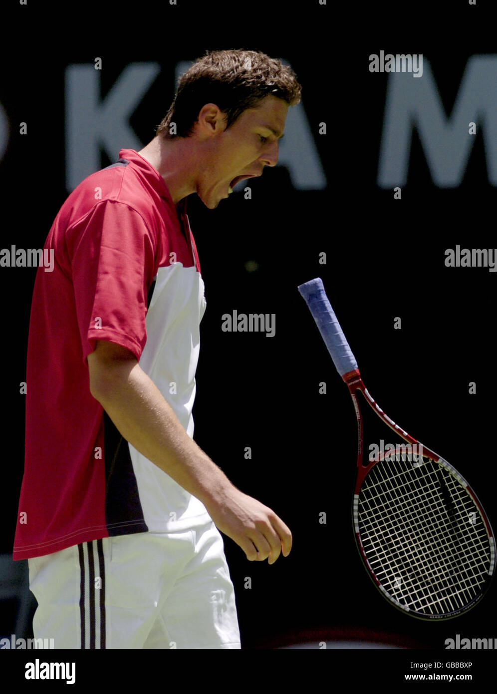 Marat Safin of Russia spits out his racket in frustration during his ...