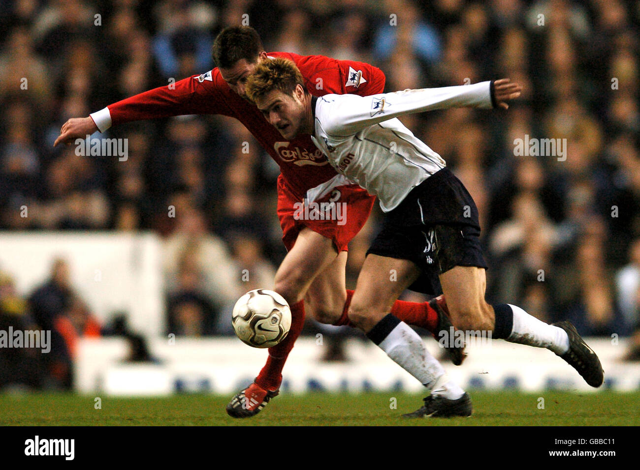 Tottenham Hotspur's Johnie Jackson (r) and Liverpool's Steve Finnan (l ...
