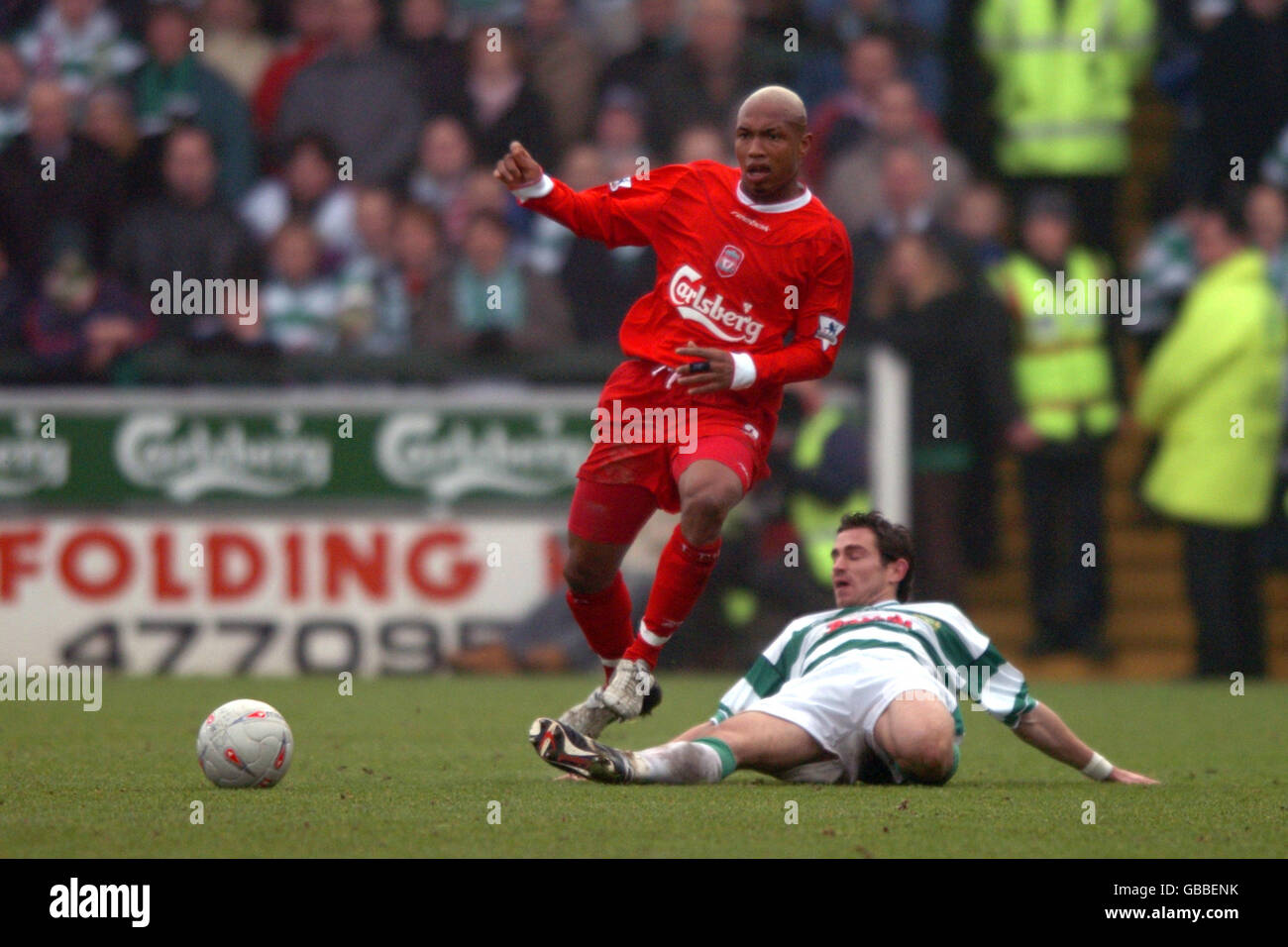 Yeovil Town's Nick Crittenden slides in to tackle Liverpool's El-Hadji ...