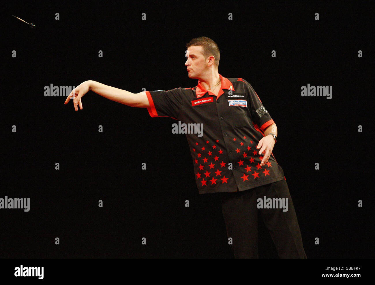 England's Colin Osborne throws against South Africa's Charles Losper ...