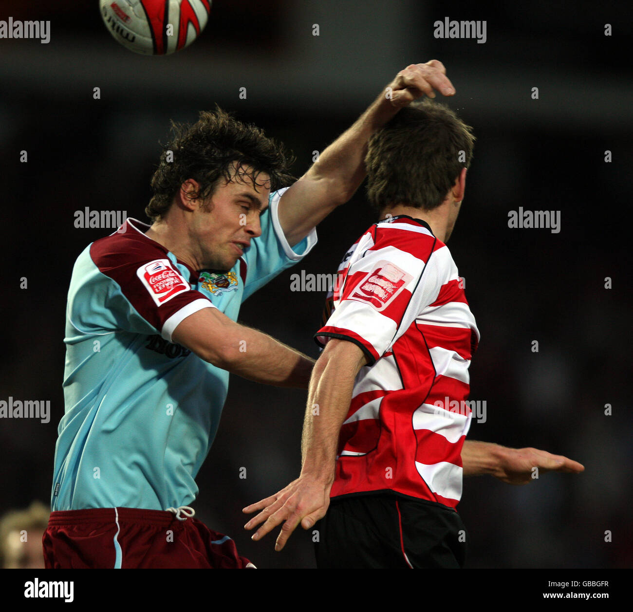 Doncaster Rovers' Michael Duff and Burnley's Martin Wood during the ...