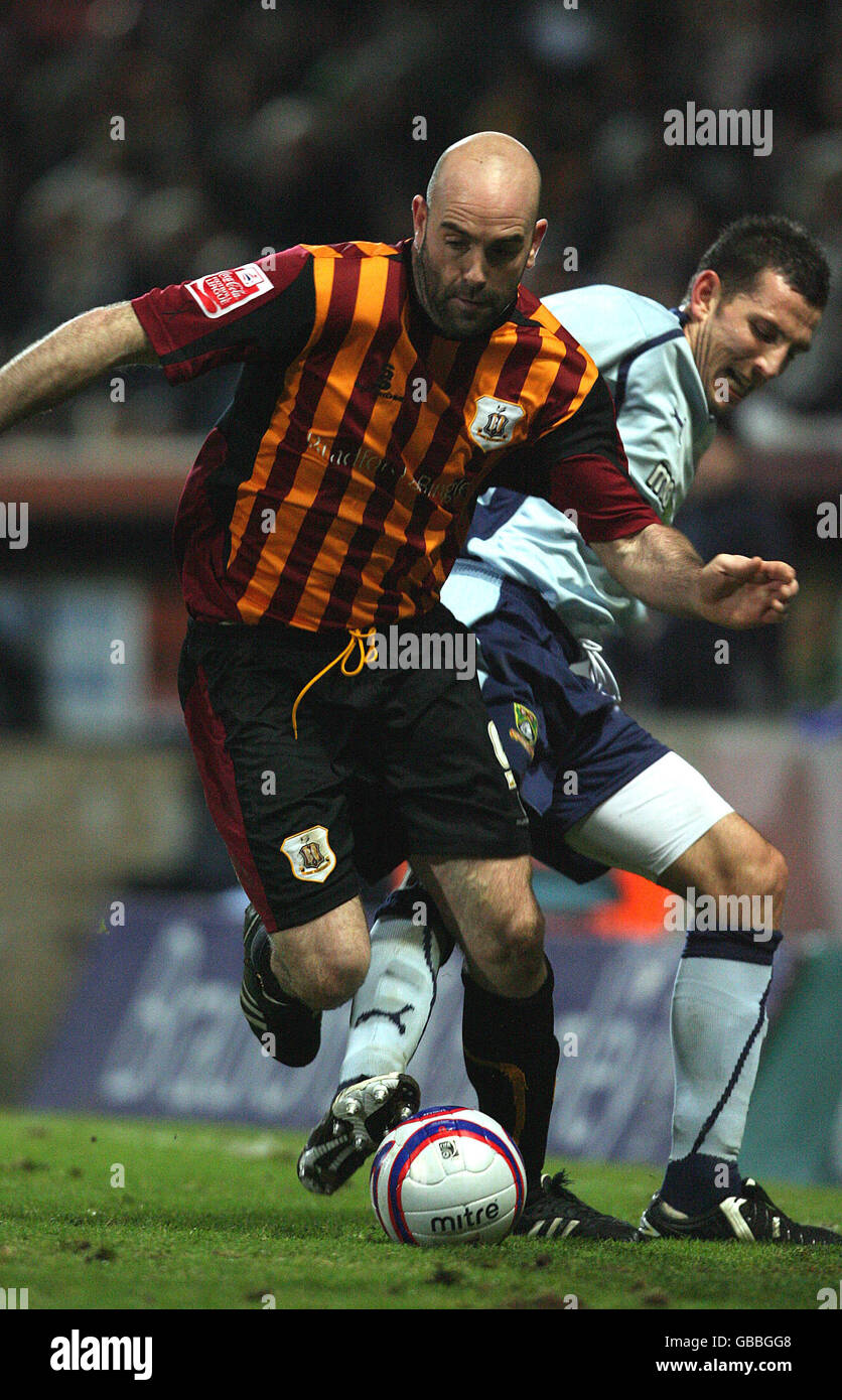 Morecambe's Adam Yates and Bradford City's Barry Conlon during the Coca ...