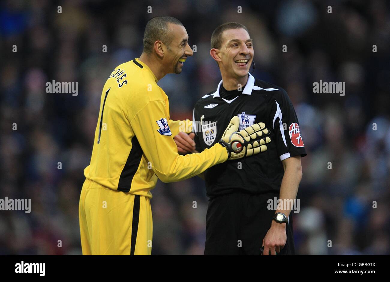 Tottenham Hotspur's goalkeeper Heurelho Gomes jokes with referee Steve ...