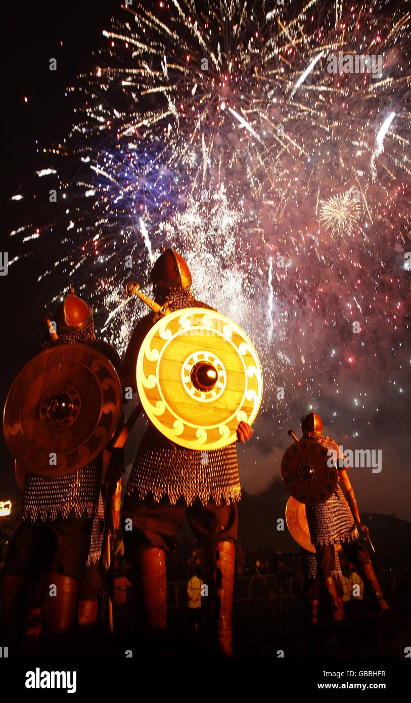 Vikings on Carlton Hill watch fireworks during the torchlight parade as ...