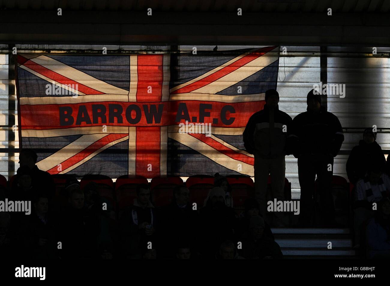 Barrow fans show support for their side in the stands hi-res stock ...